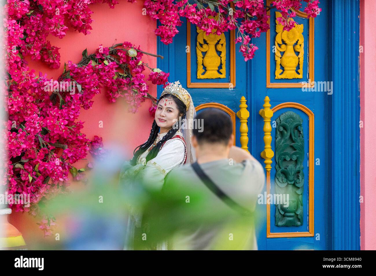 Tourists visit the Grand Bazaar in Urumqi City, northwest China's ...
