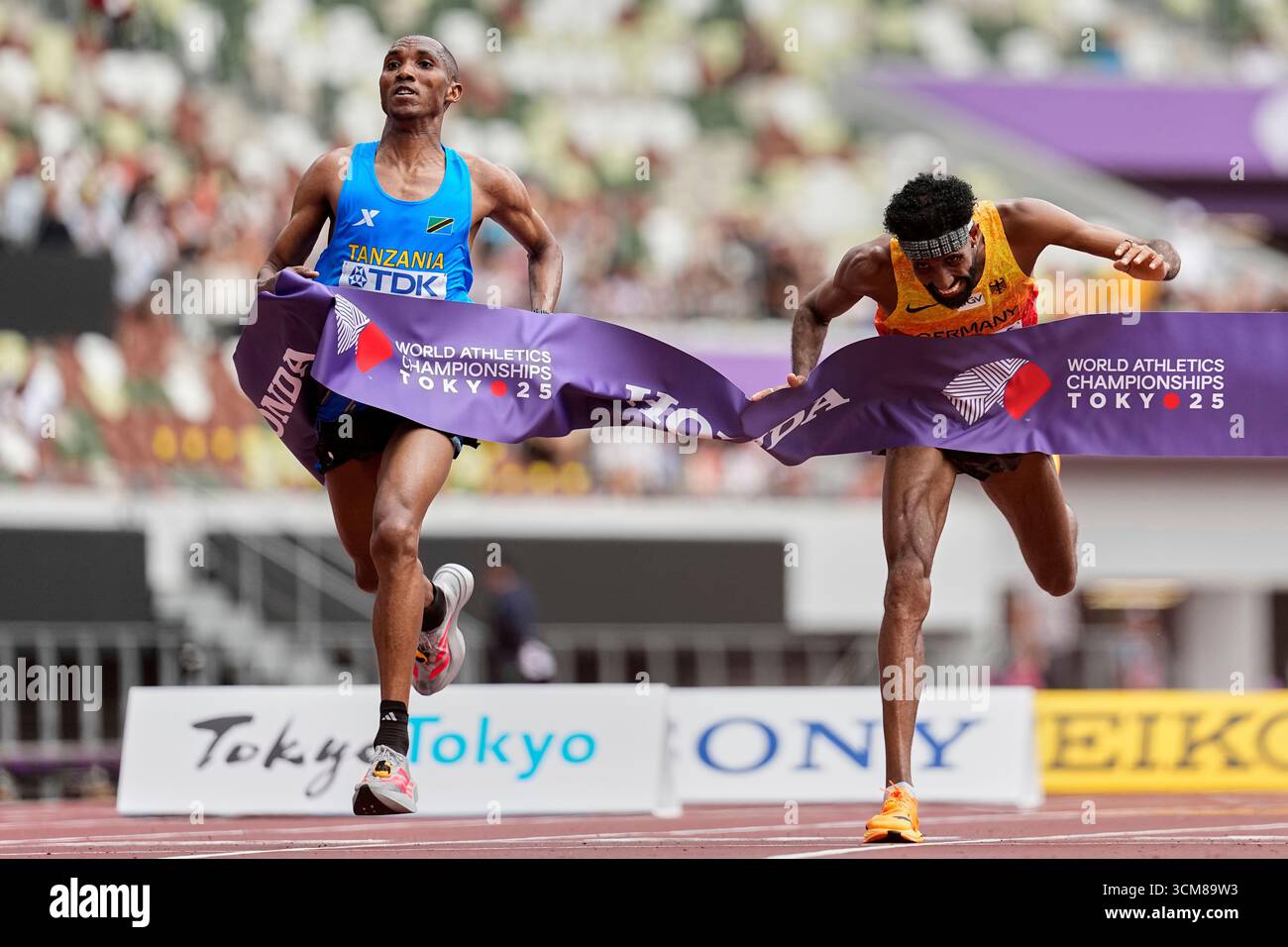 Tanzania's Alphonce Felix Simbu, left, wins the gold in the men's ...