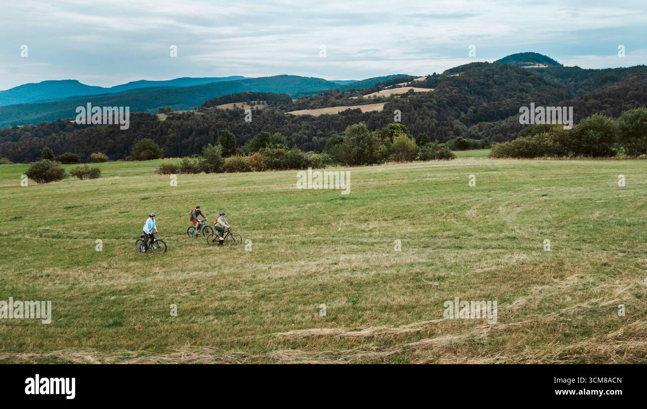 Young family on biking hi-res stock photography and images - Alamy
