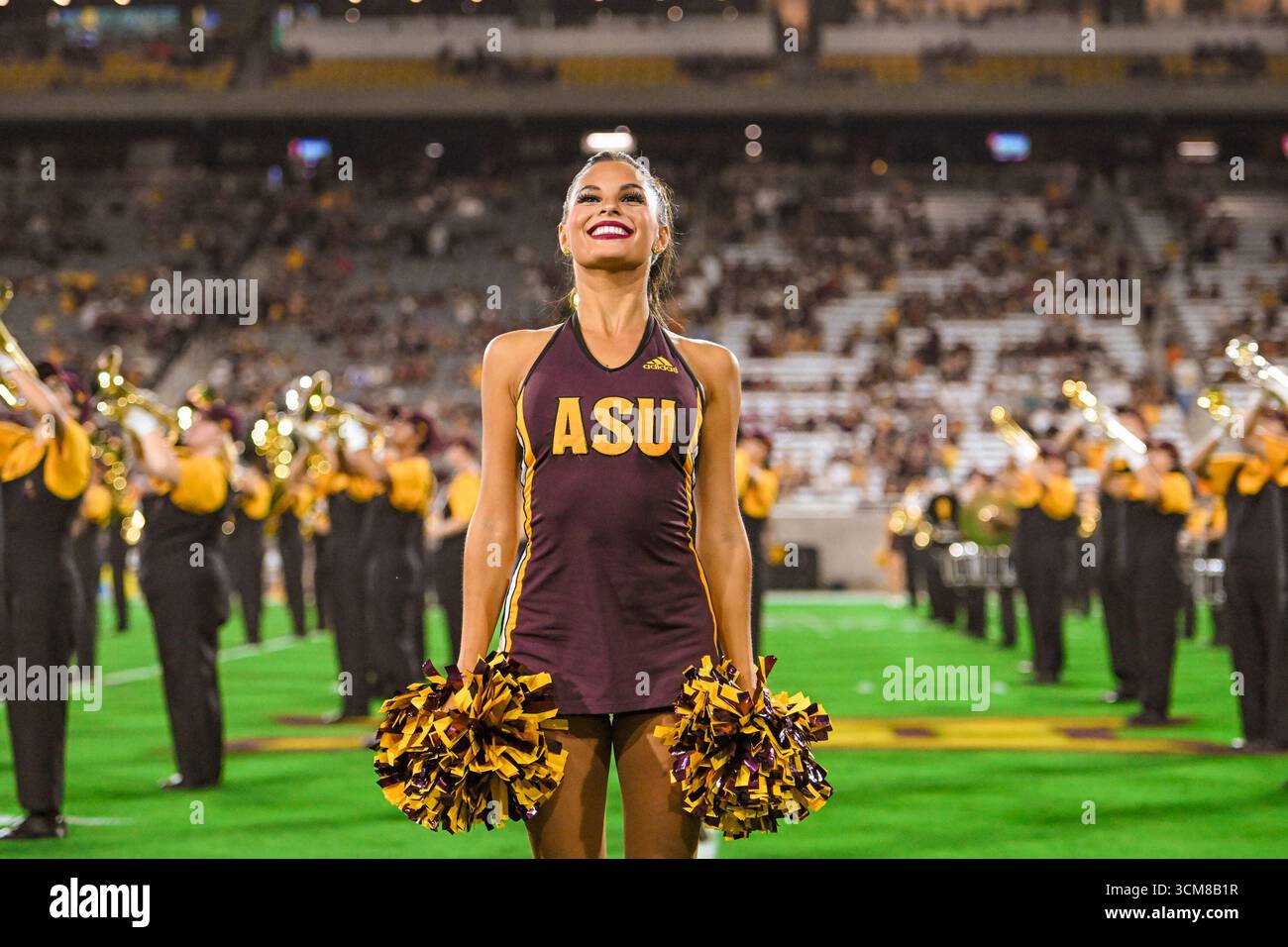 Arizona State Sun Devils cheer performs before an NCAA football game ...