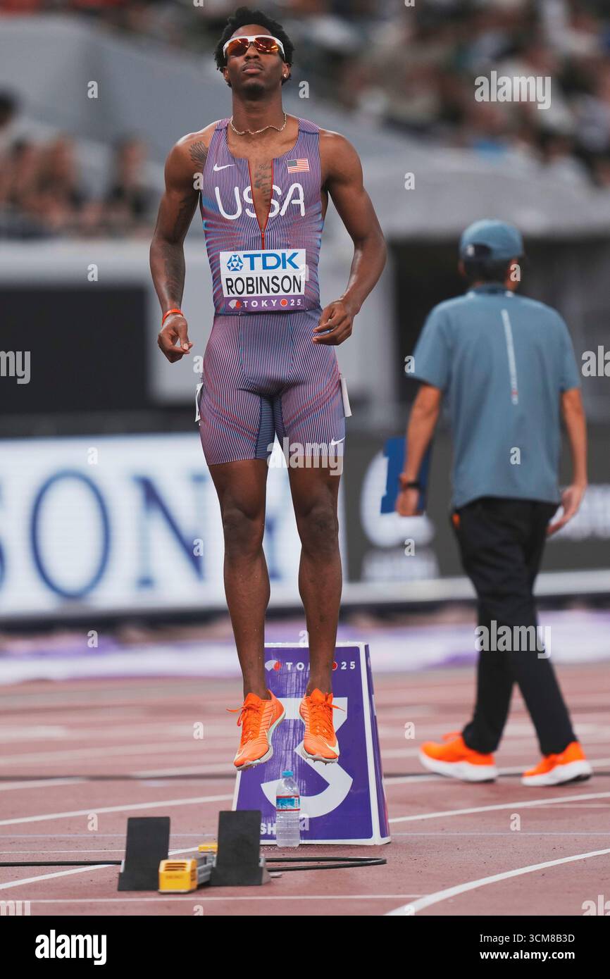 United States' Chris Robinson warms up to compete in the men's 400 ...
