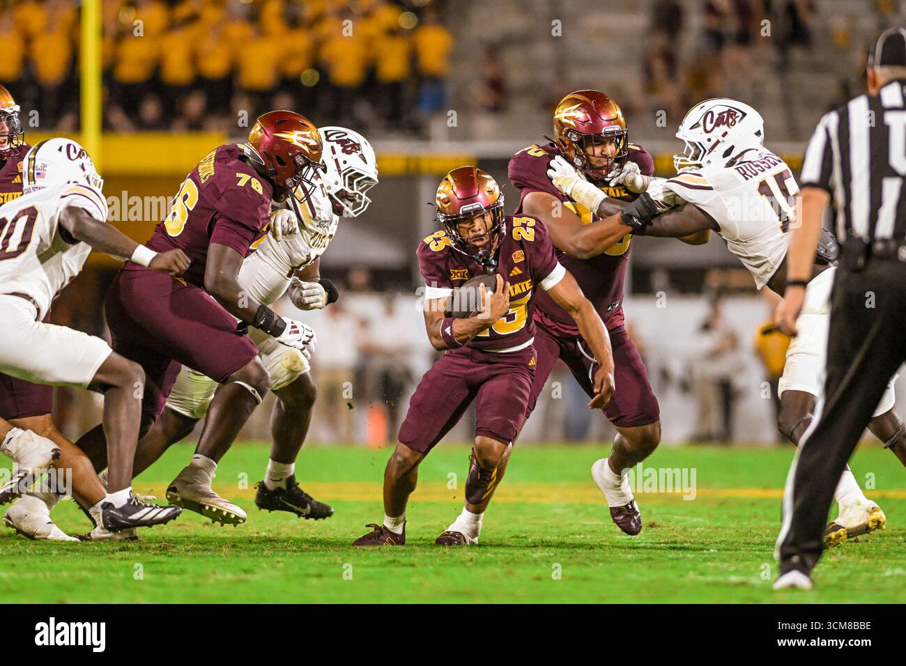 Arizona State Sun Devils running back Demarius Robinson (23) scrambles ...