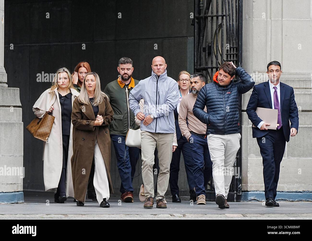 Familes of the victims with their legal team arrive at Liverpool Town ...