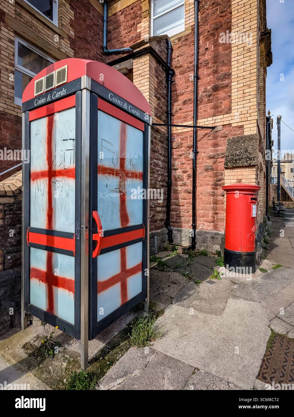 Paignton, UK. 15th Sep, 2025. Traditional red telephone box with ...
