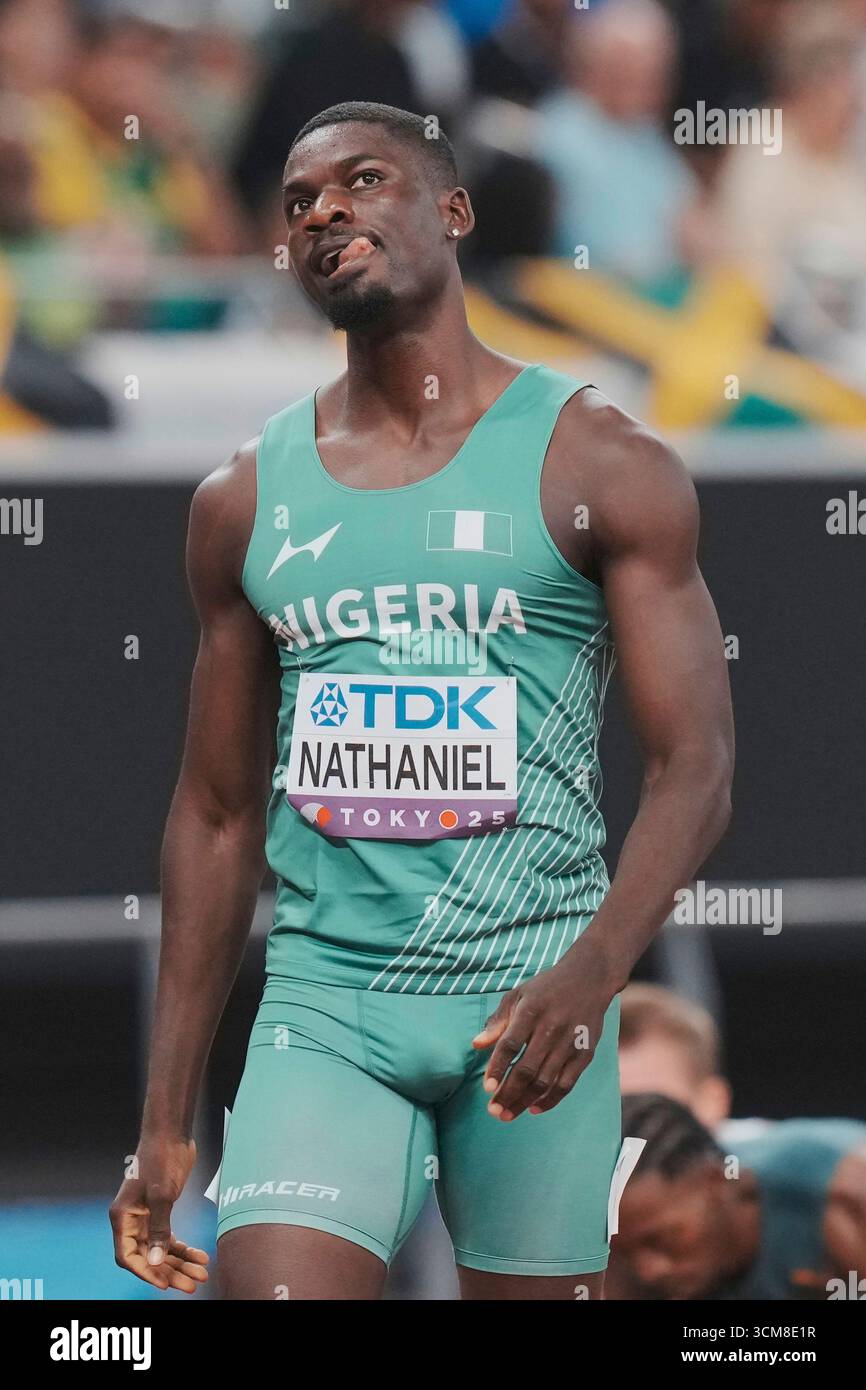 Nigeria's Ezekiel Nathaniel reacts during the men's 400 meters hurdles ...