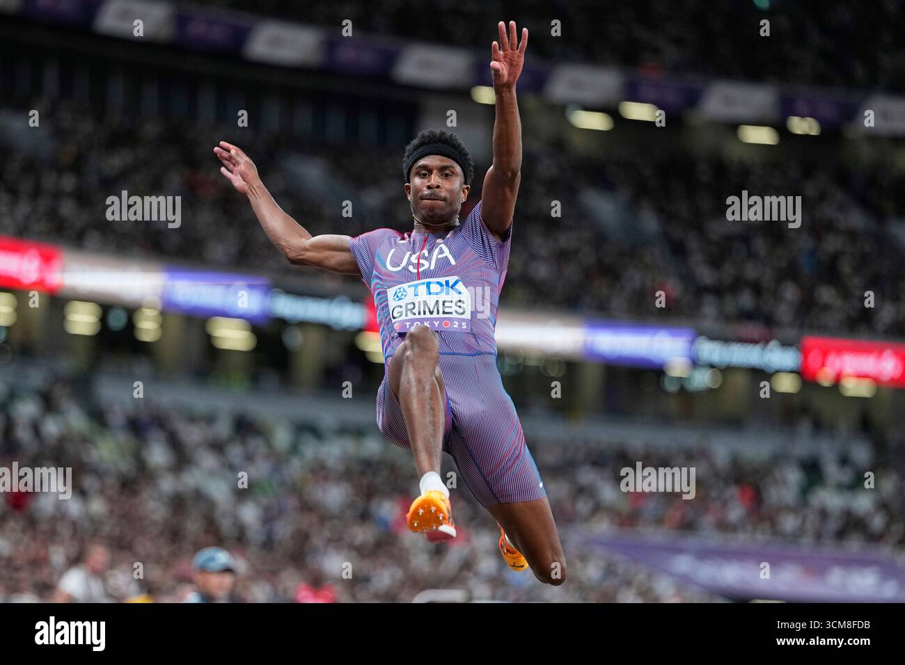 United States' Isaac Grimes competes in the men's long jump ...
