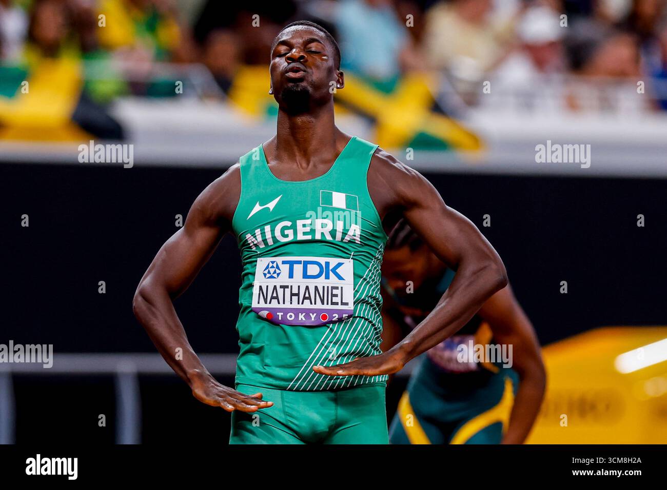 Ezekiel Nathaniel of Nigeria celebrates after competing in the Men's ...