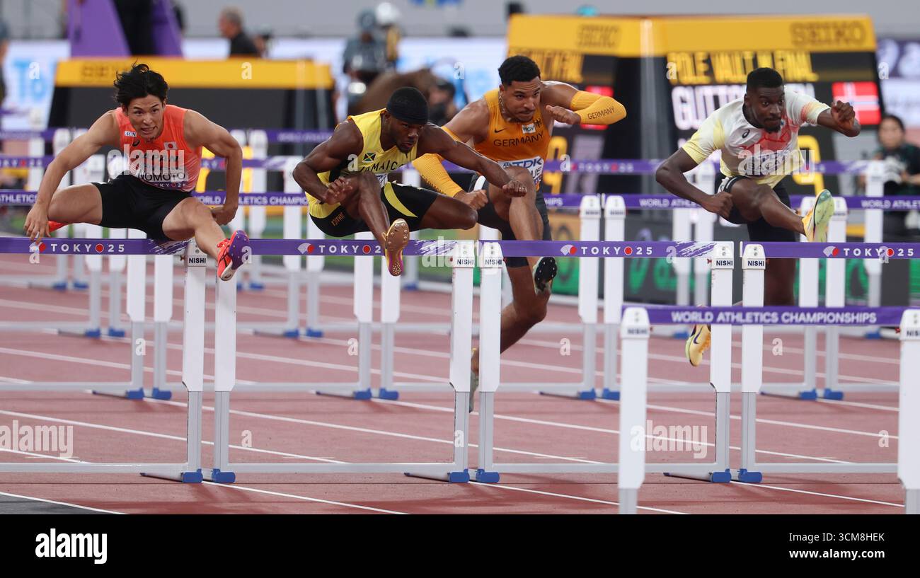 Athletes compete in the men's 110 meters hurdles heat at the World ...