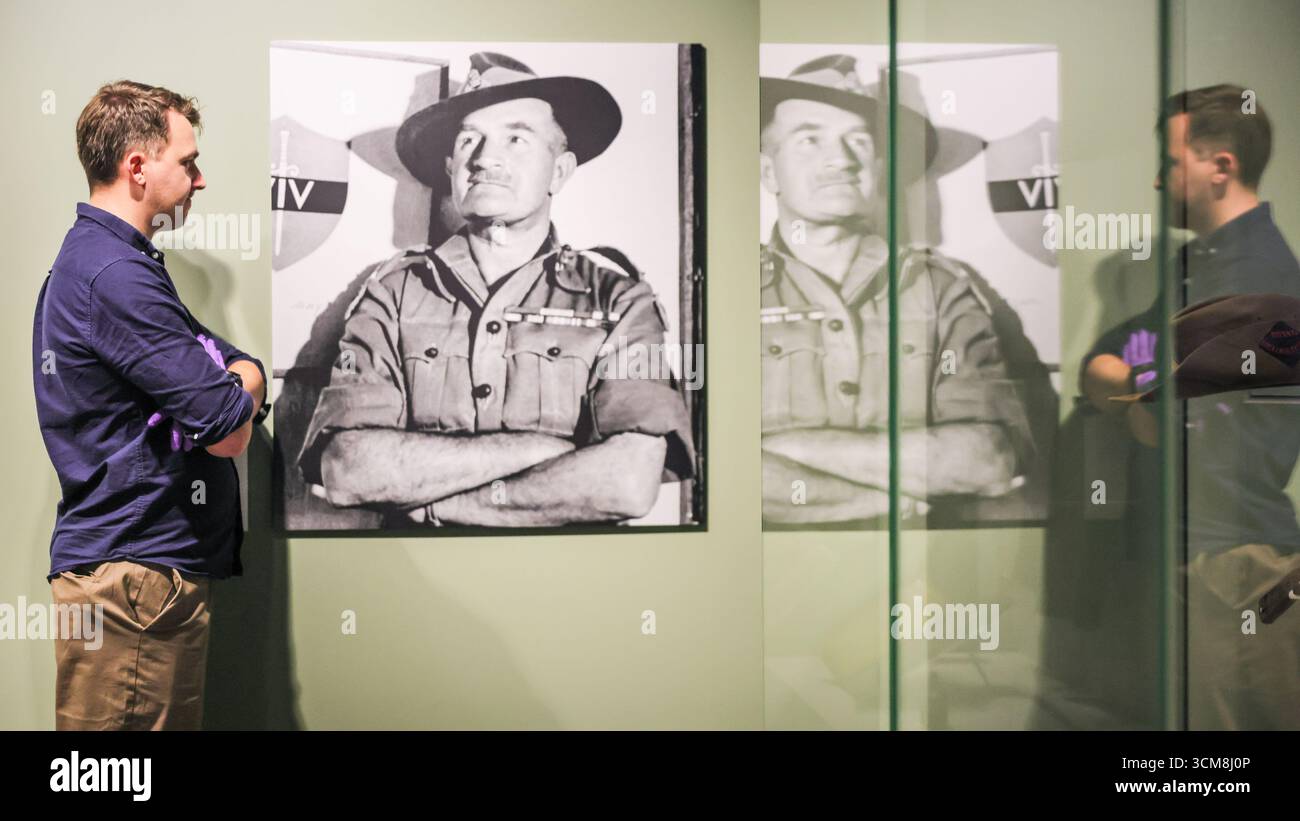 London, UK, 15th Sep 2025. Conservator Joshua Seymour a with a picture ...