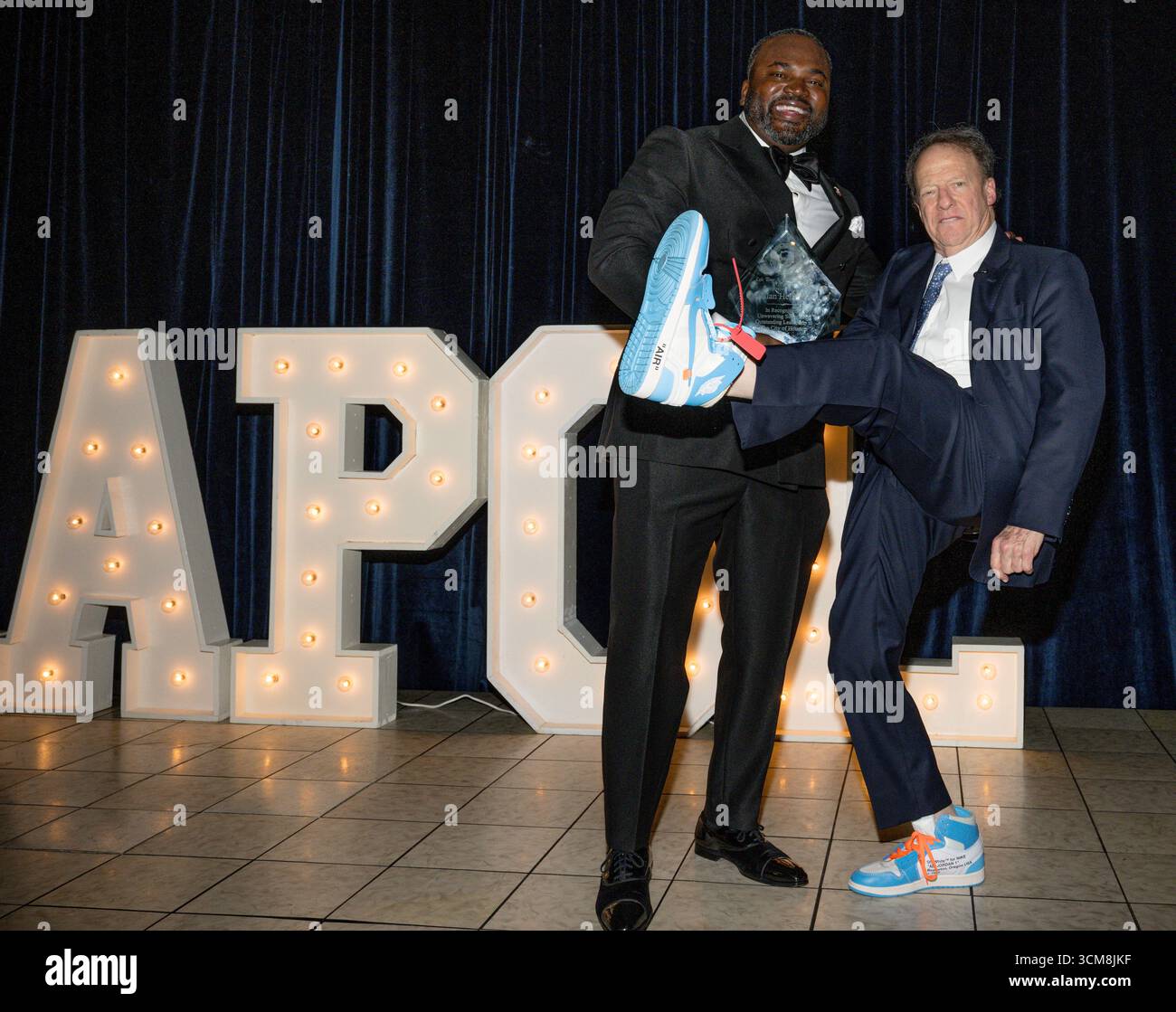 (R) Alan Helfman pose on stage after receiving the Lifetime ...