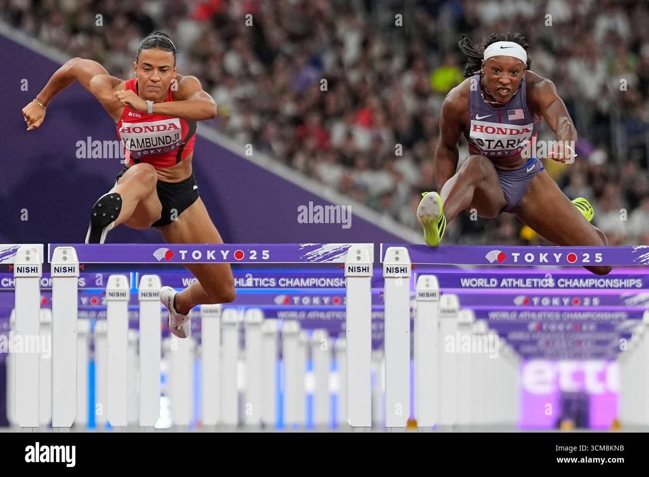 United States' Grace Stark and Switzerland's Ditaji Kambundji compete ...