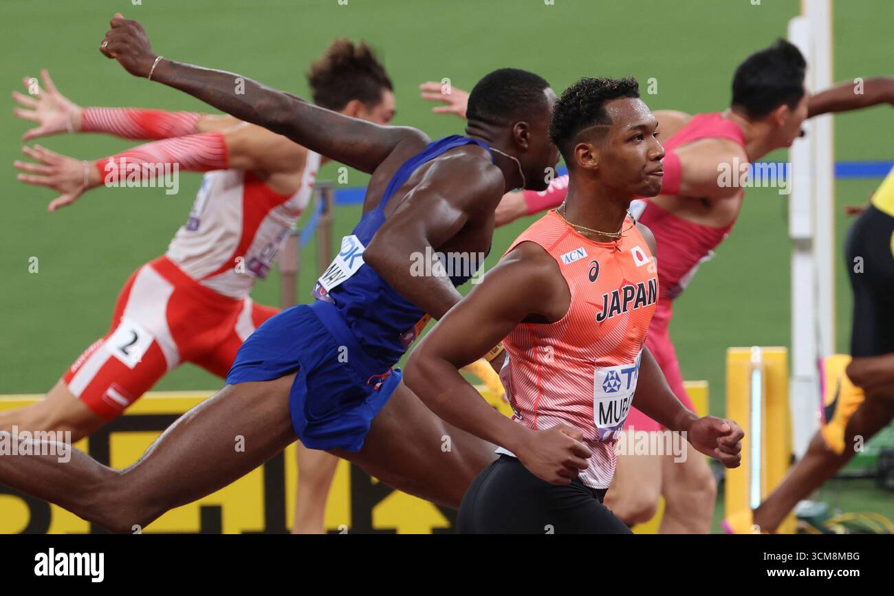Athletes compete in the men's 110 meters hurdles heat 5 at the World ...