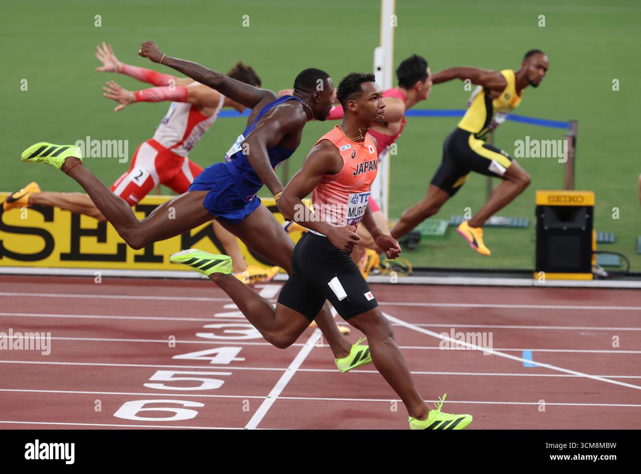 Rachid MURATAKE of Japan (front) passs a finish line in the men's 110 ...