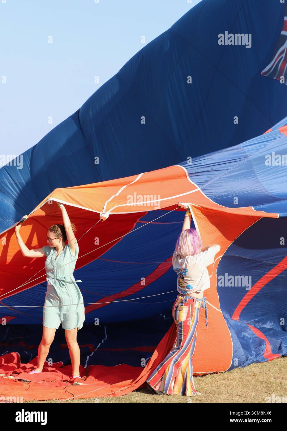 Fly navy bristol balloon team hi-res stock photography and images - Alamy