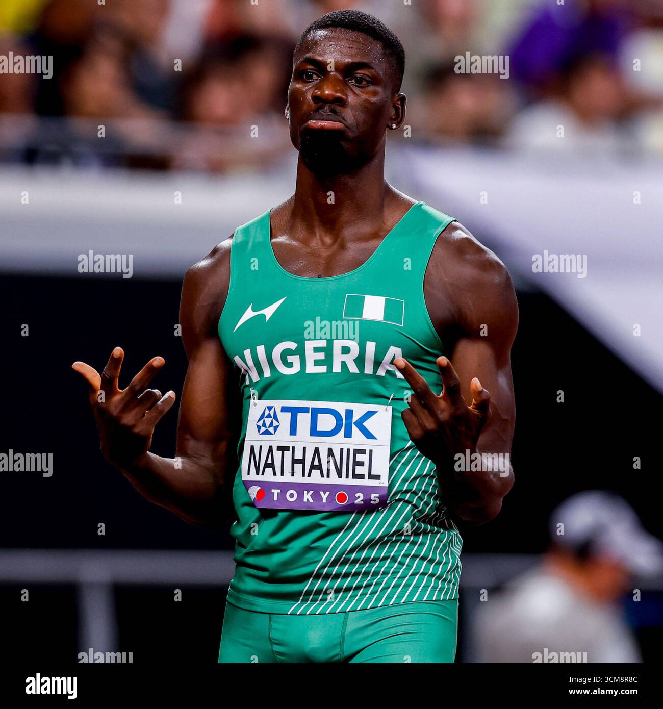 Ezekiel Nathaniel of Nigeria celebrates after competing in the Men's ...