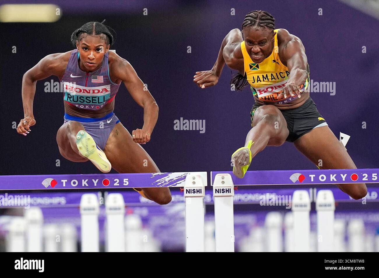 United States' Masai Russell and Jamaica's Danielle Williams compete in ...