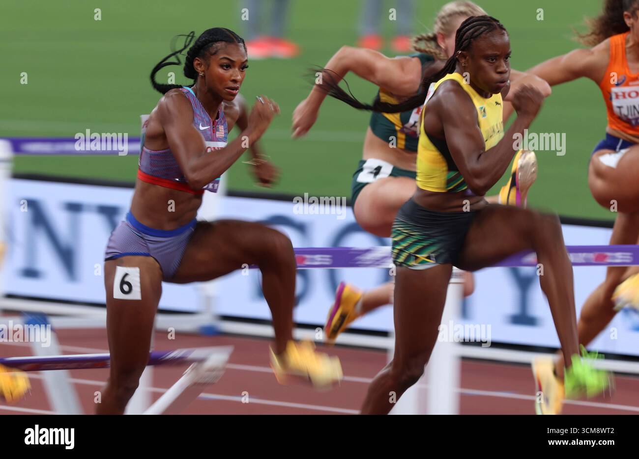Masai RUSSELL of the United States (L) and Danielle WILLIAMS of Jamaica ...