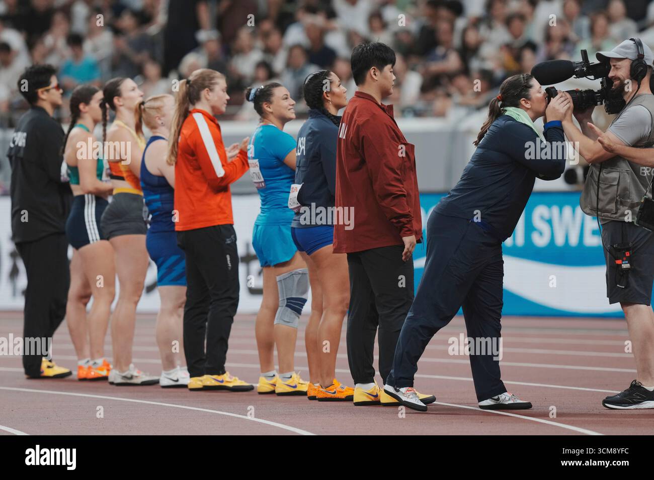 United States' Deanna Price kisses the camera before competing in the ...