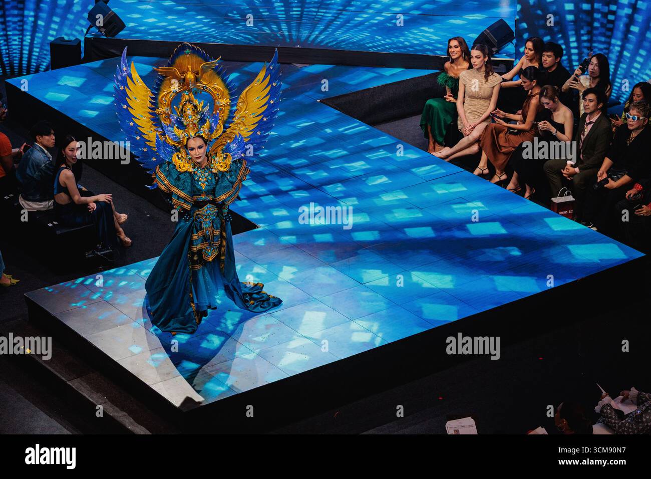 Kaycia Lee, contestant from Indonesia seen in a national costumes ...