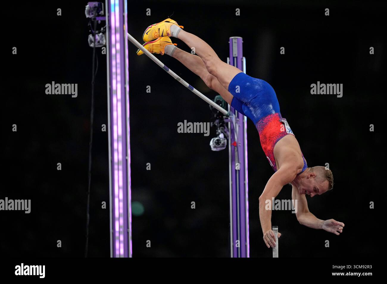United States' Sam Kendricks makes a clearance in the men's pole vault ...