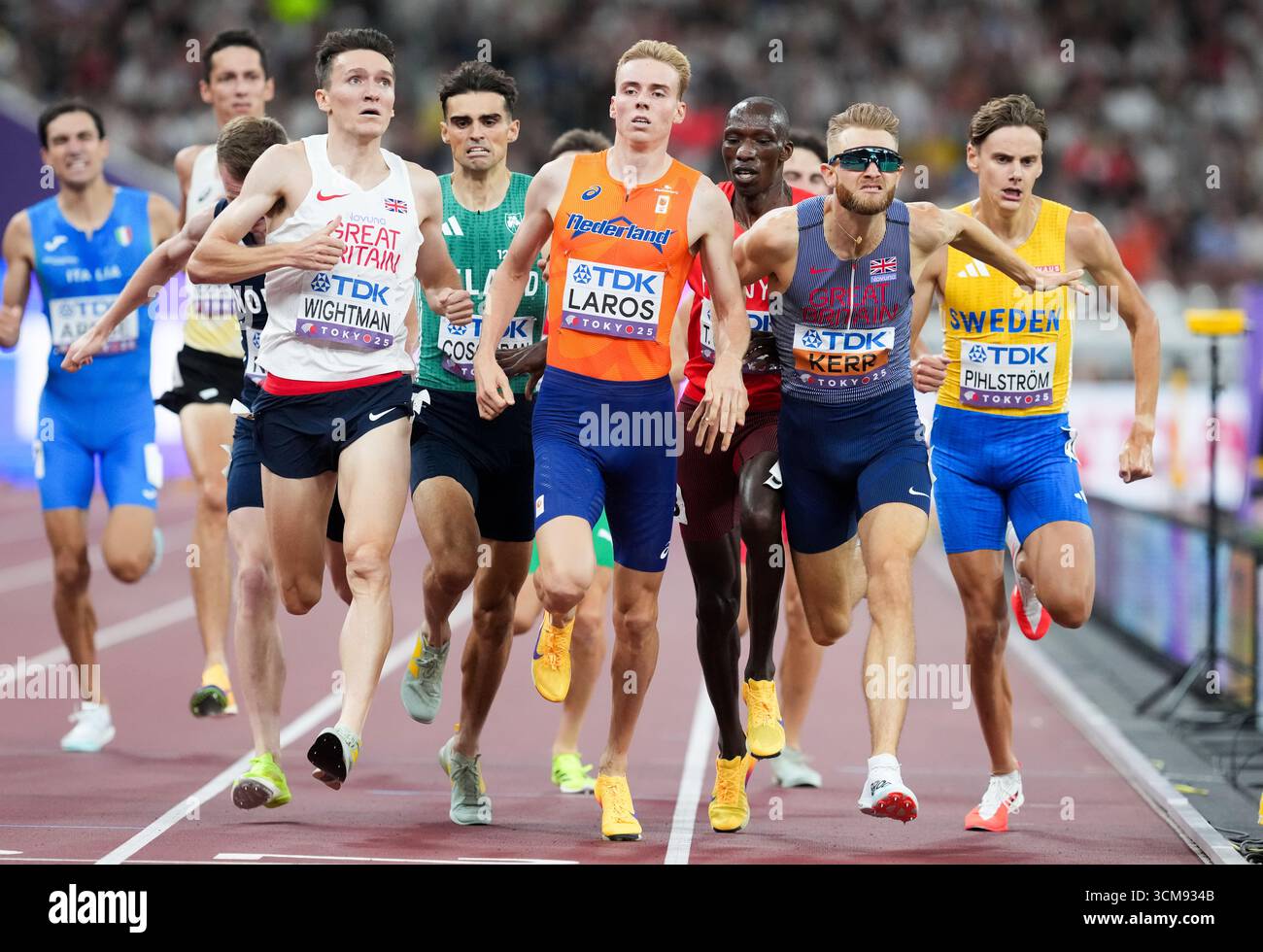 Josh Kerr (second right) and Jake Wightman (left) of Great Britain ...