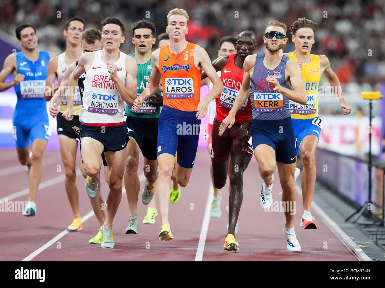 Josh Kerr (second right) and Jake Wightman (left) of Great Britain ...