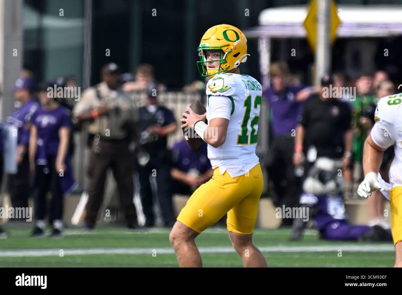 Oregon quarterback Brock Thomas looks to pass the ball against ...