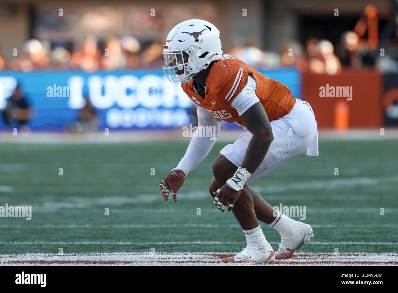 AUSTIN, TX - SEPTEMBER 13: Linebacker Colin Simmons #1 of the Texas ...