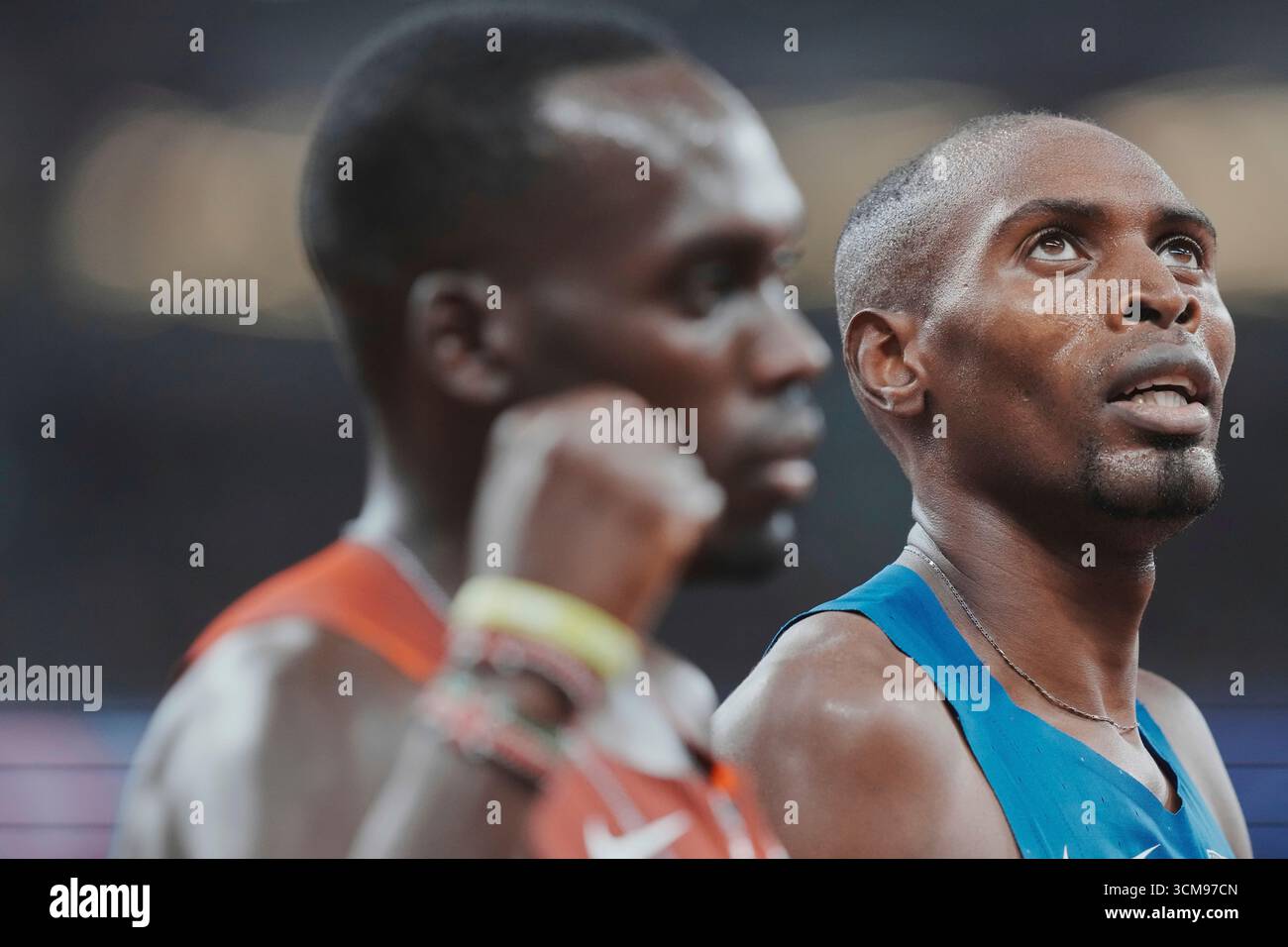 United States' Jonah Koech, right, and Kenya's Reynold Cheruiyot react ...