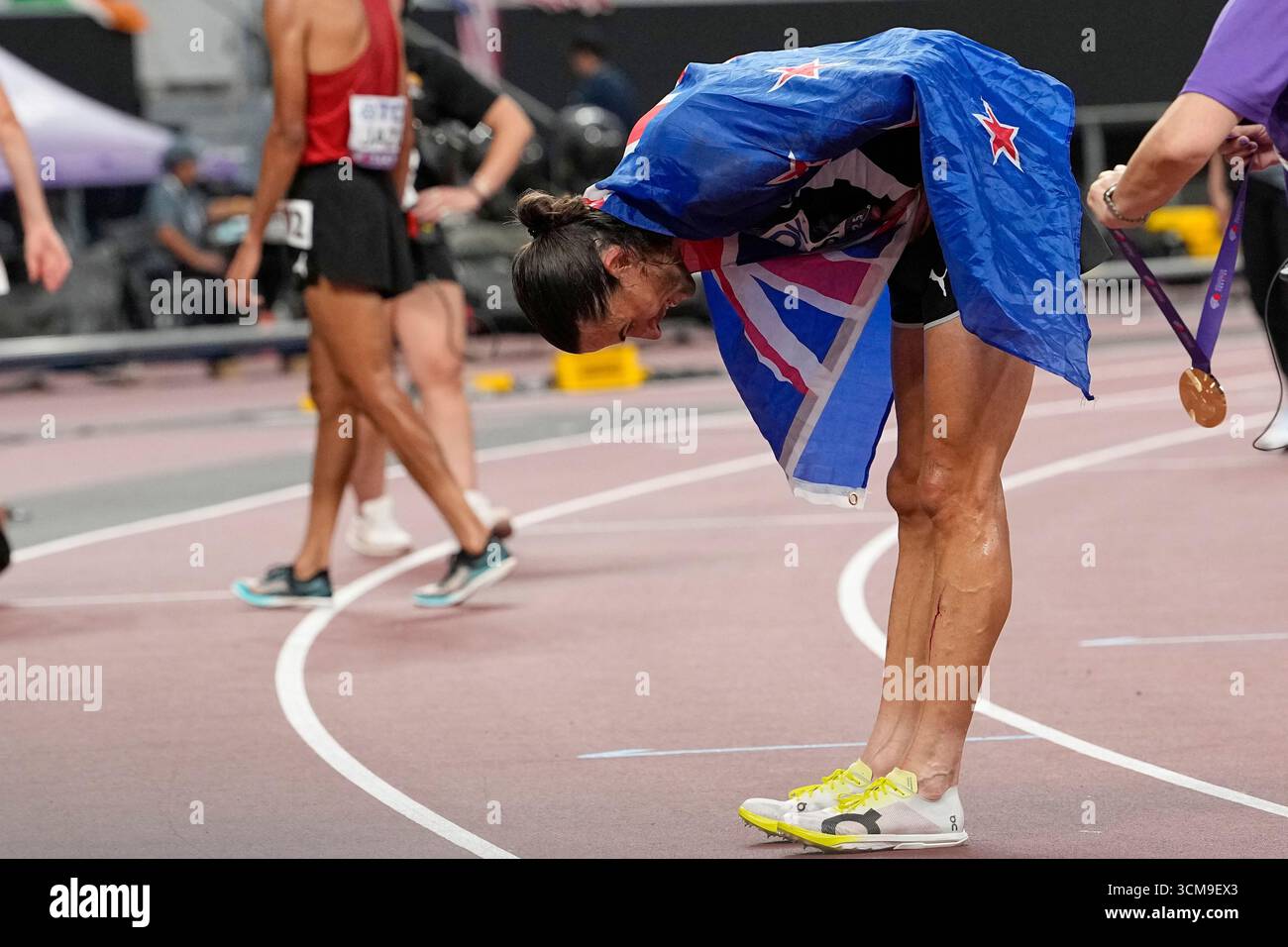 New Zealand's Geordie Beamish celebrates after winning the men's 3,000 ...