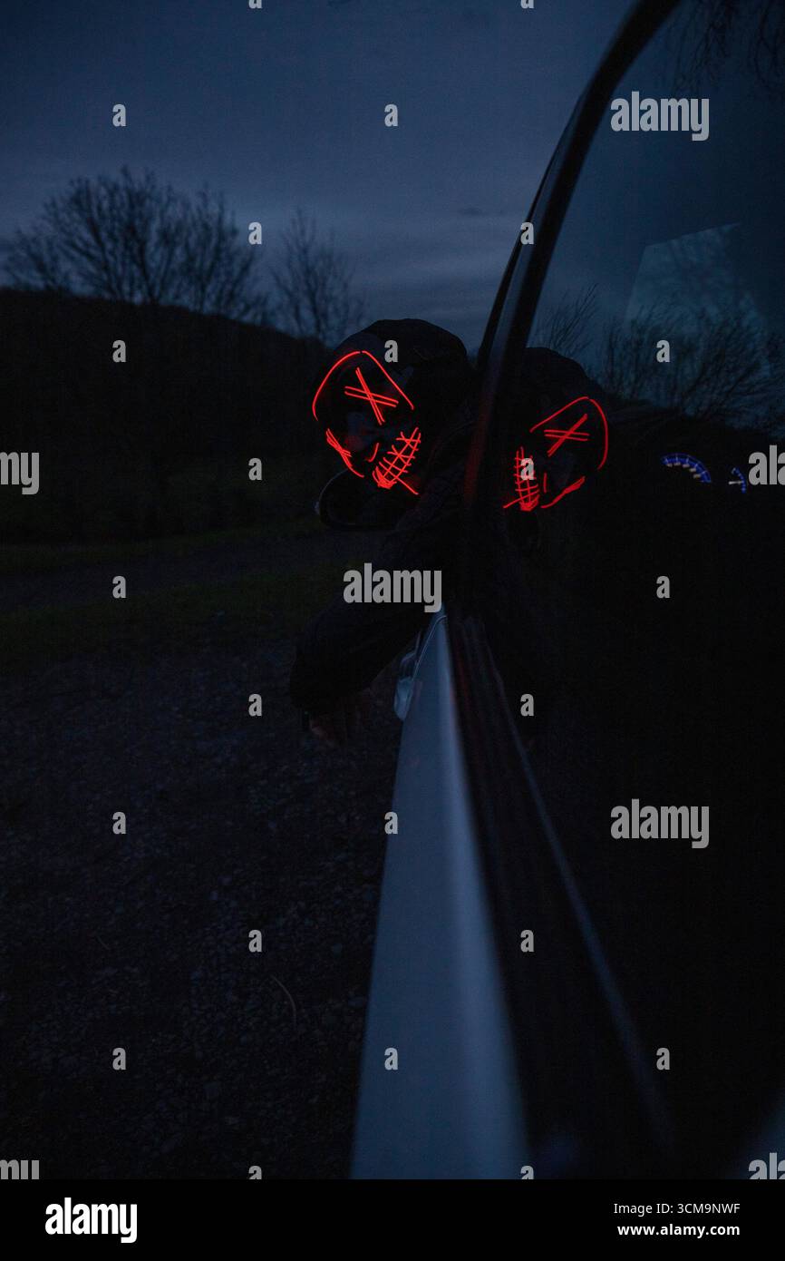 Purge mask, Halloween, LED mask, scary creepy man with LED mask in car ...