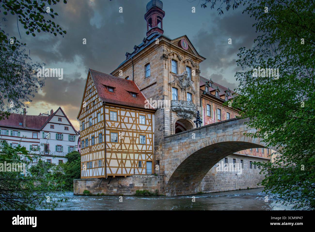 View of a historic building on a bridge, half-timbered house and town ...