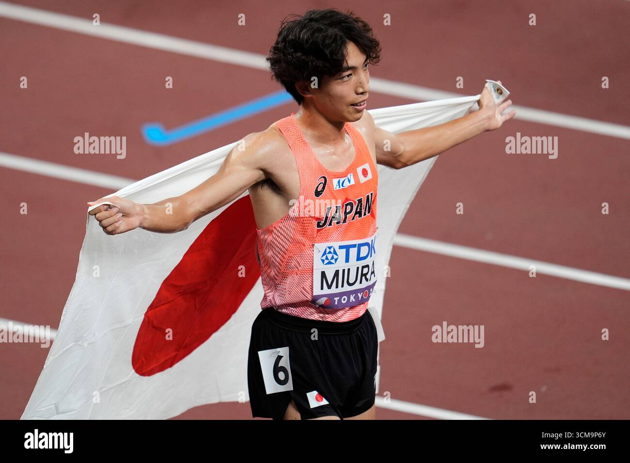 Japan's Ryuji Miura celebrates after the men's 3,000 meters ...