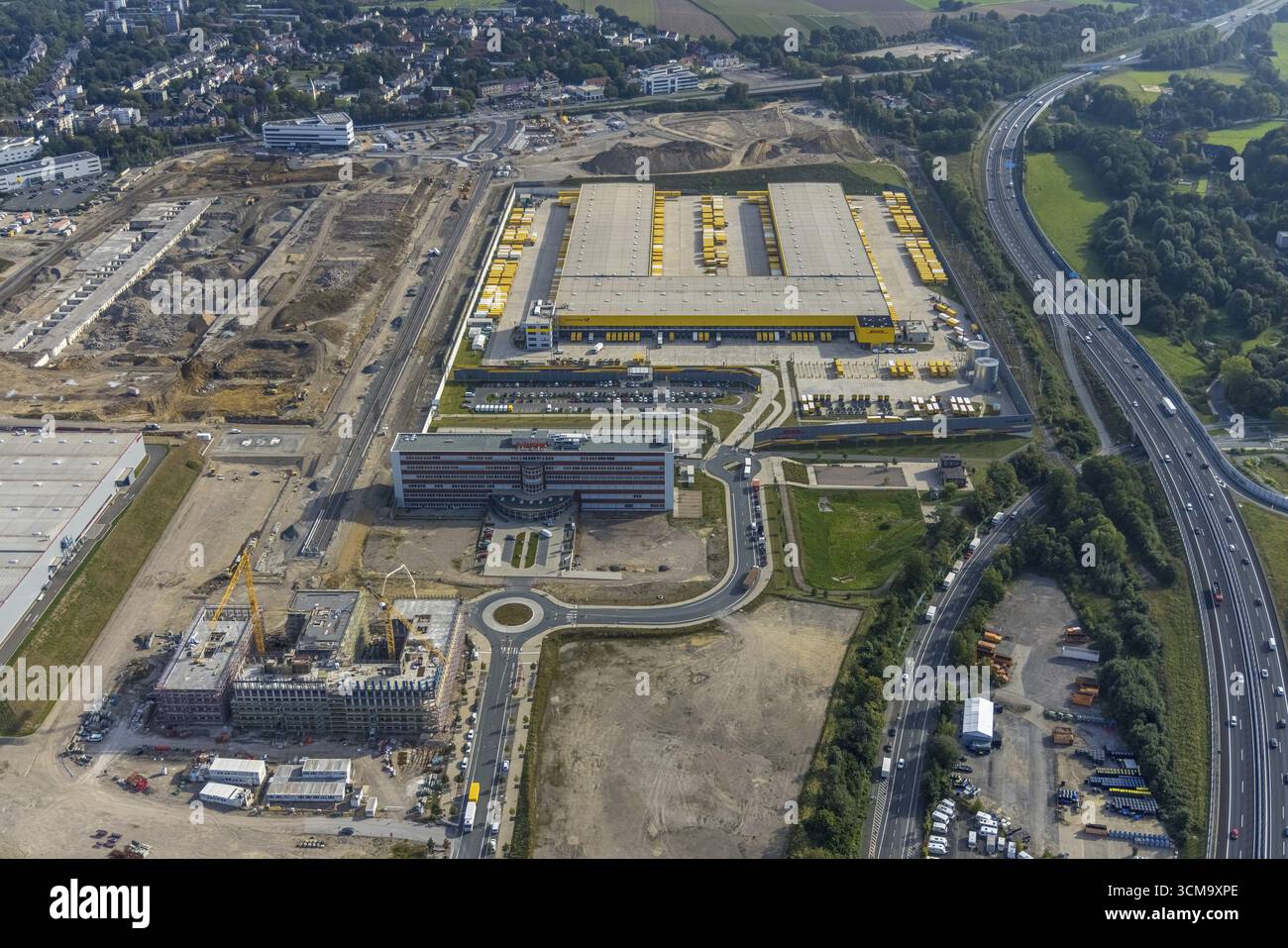 Aerial view, Mark 51Â°7 industrial estate and construction site with ...