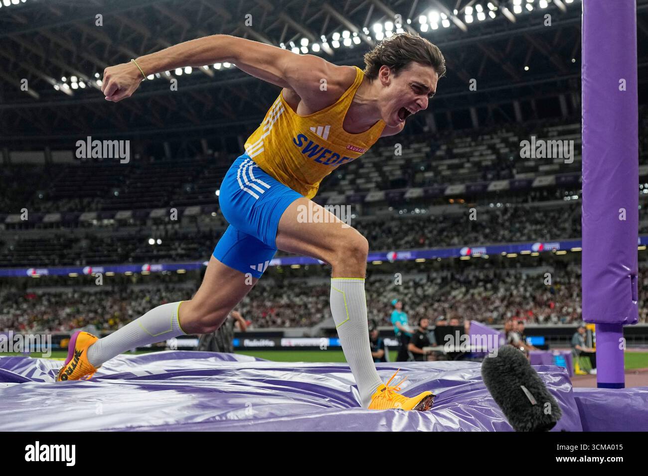 Sweden's Armand Duplantis reacts after setting a world record in the ...