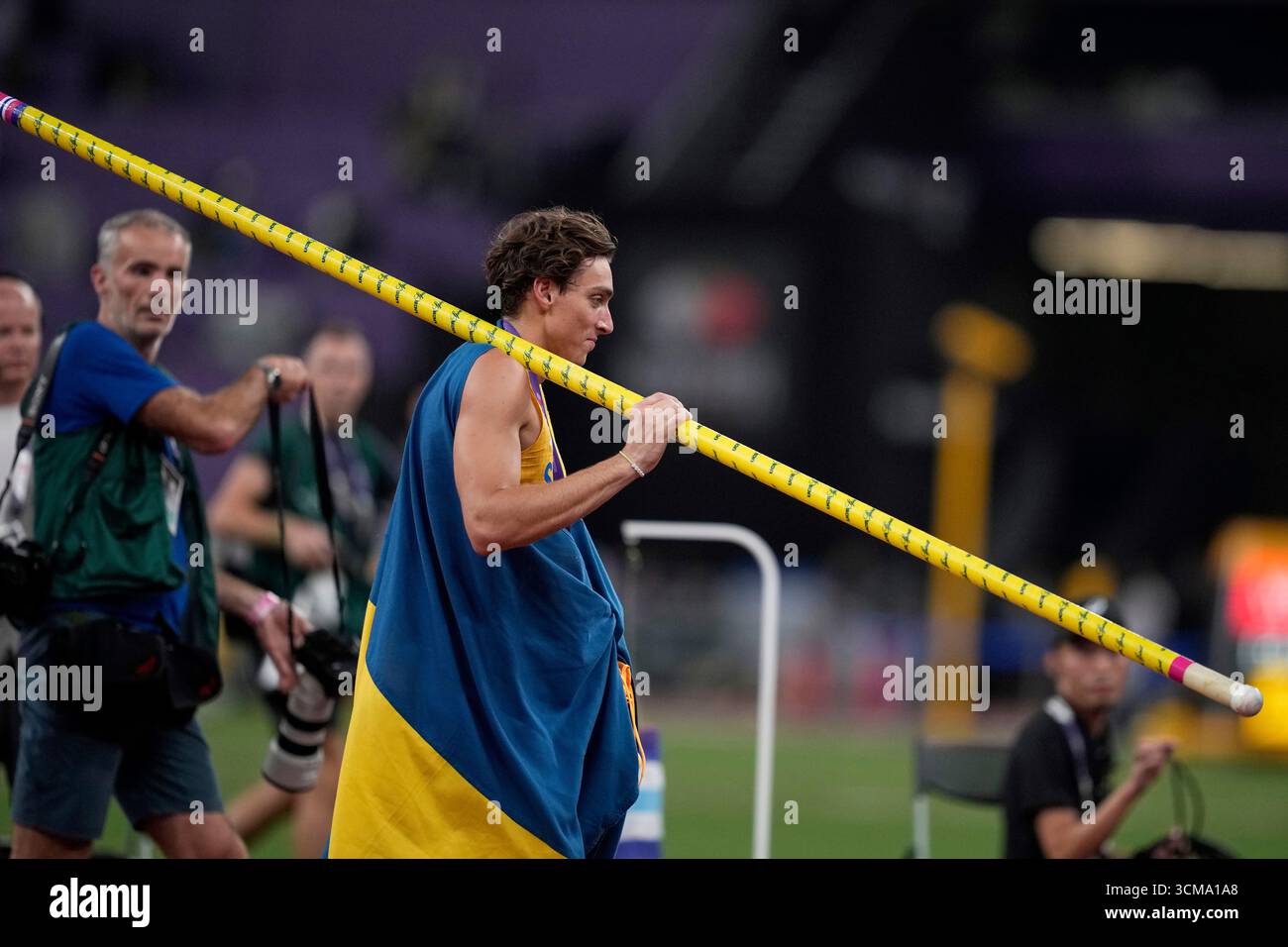 Sweden's Armand Duplantis walks away after making a clearance to break ...