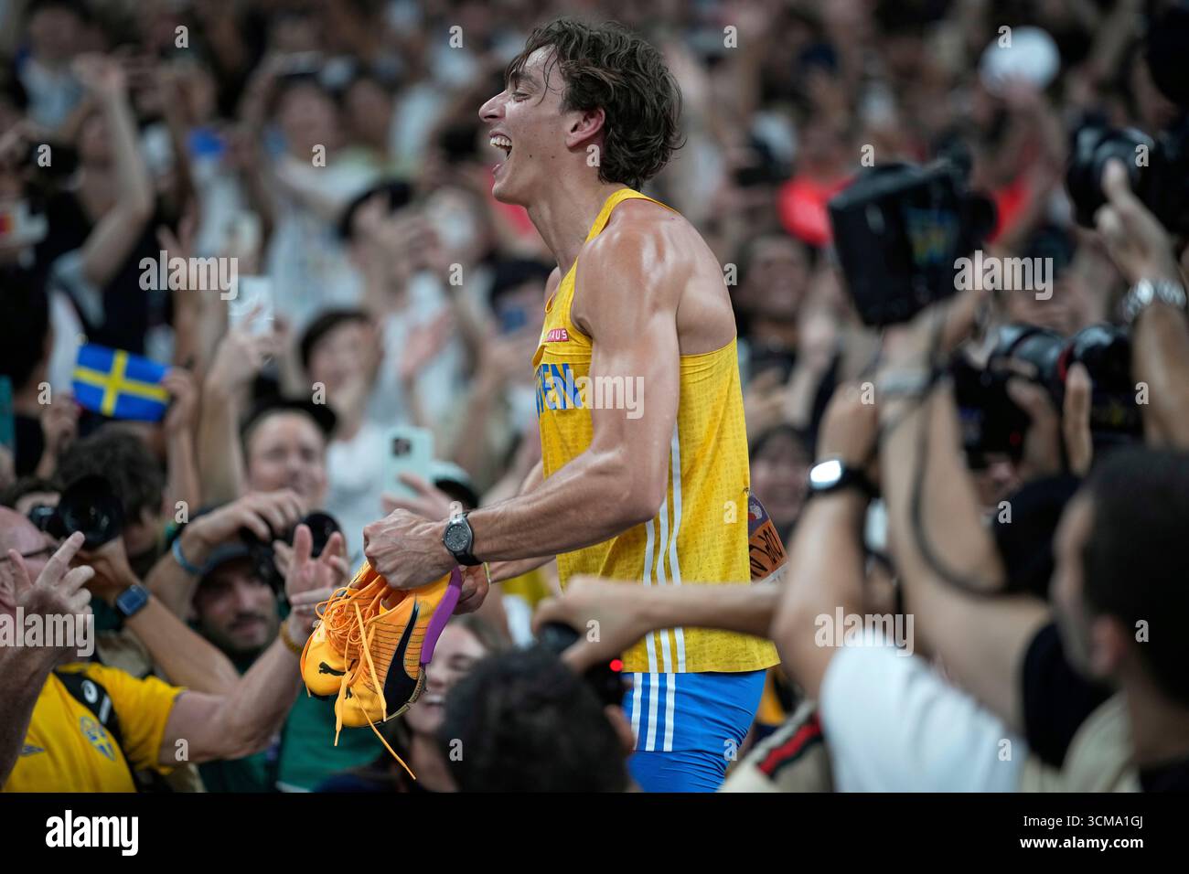 Sweden's Armand Duplantis celebrates after making a clearance to break ...