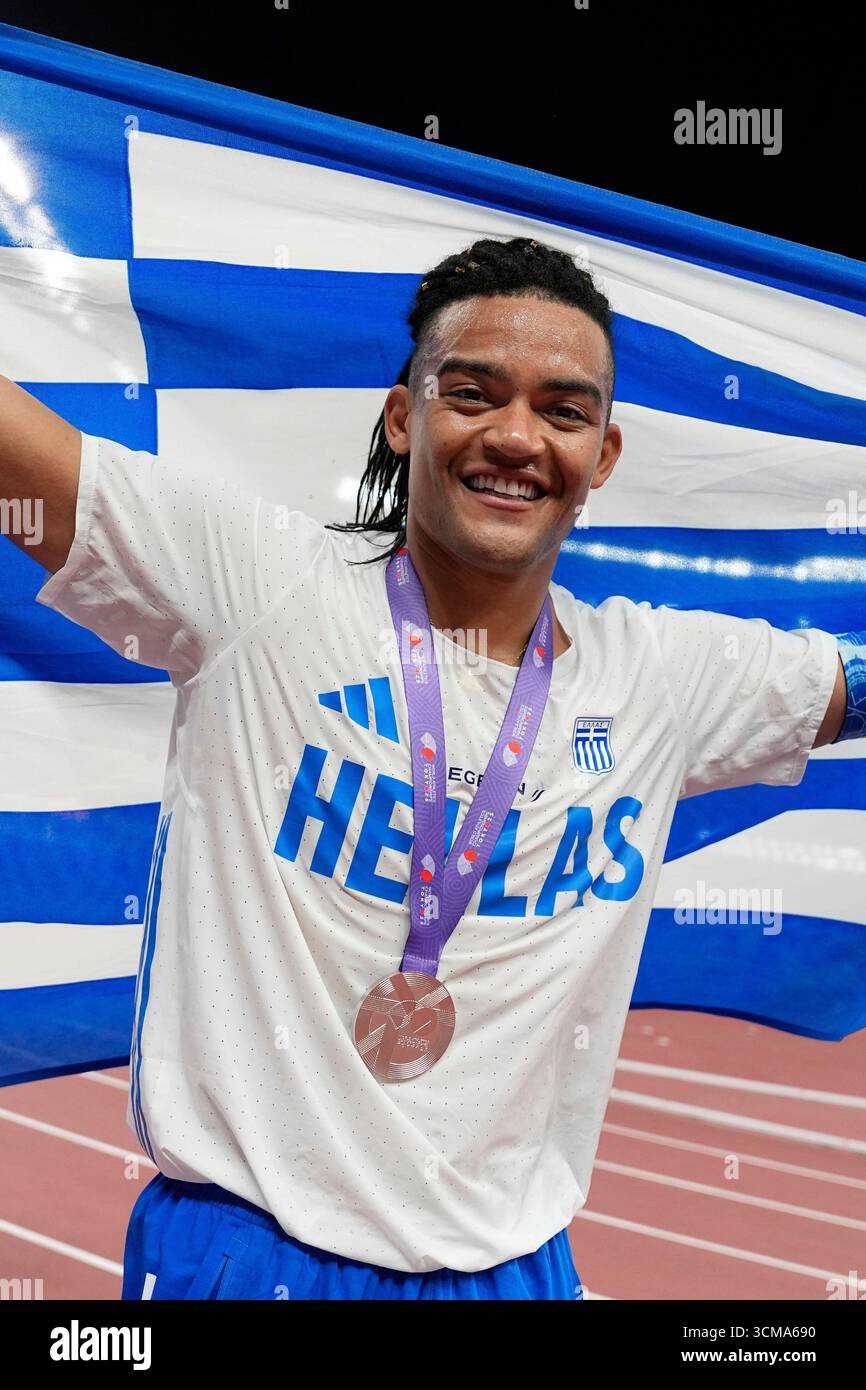 Greece's Emmanouil Karalis celebrates after winning the silver medal in ...