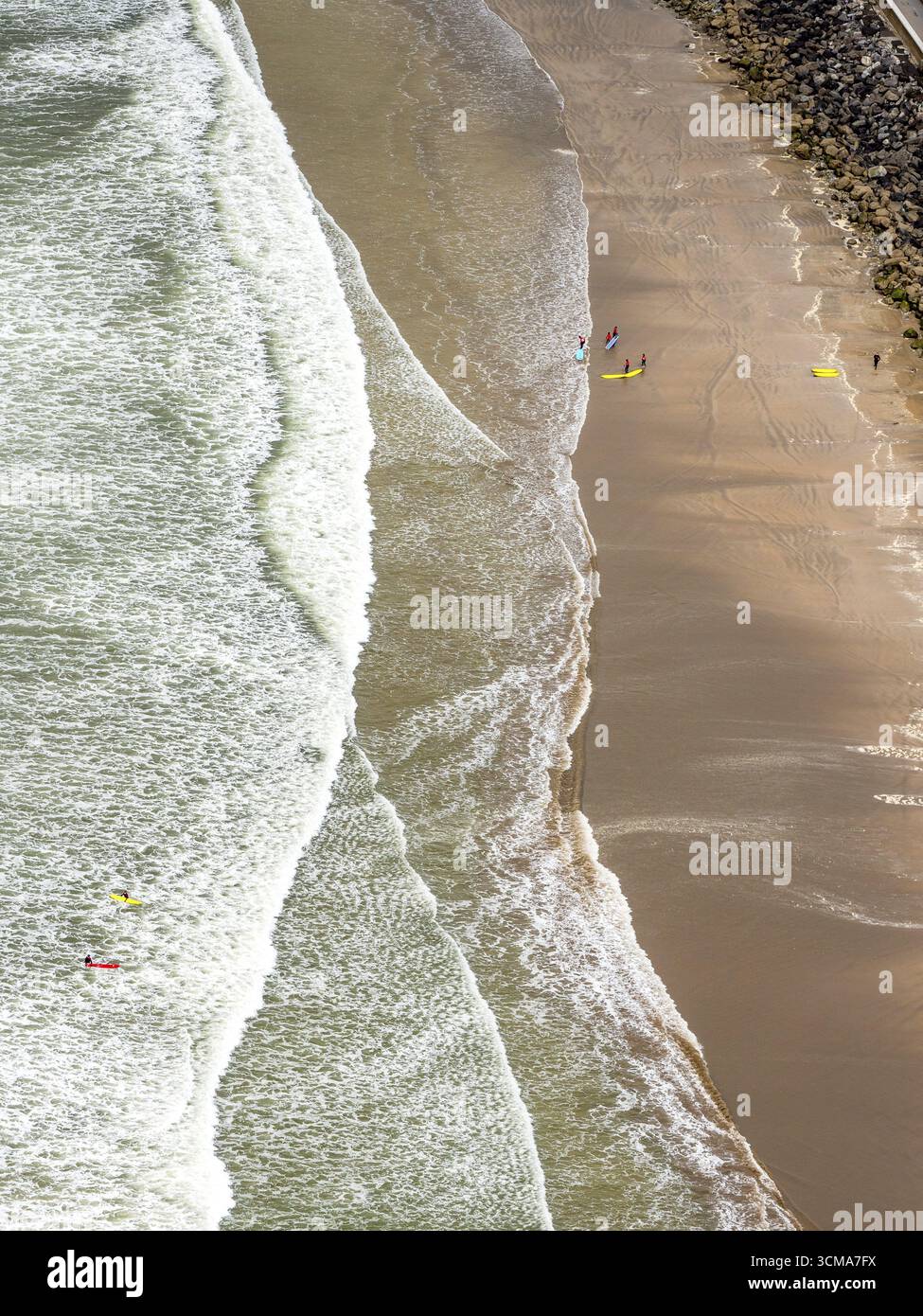 Sandy beach beach of Lahinch with surfers, Lahinch at Liscannor Bay ...
