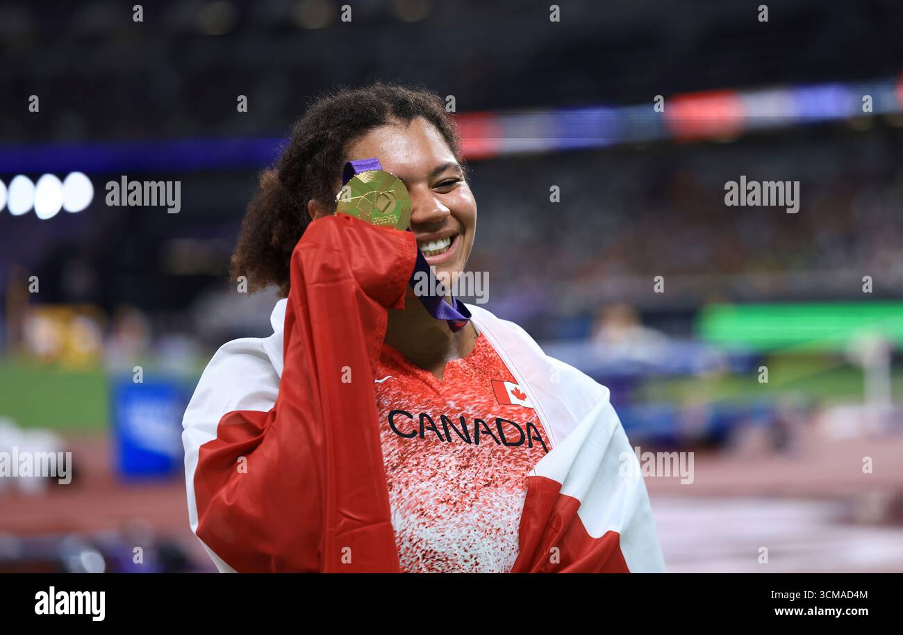 Camryn ROGERS of Canada celebrates with a gold medal after winning the ...