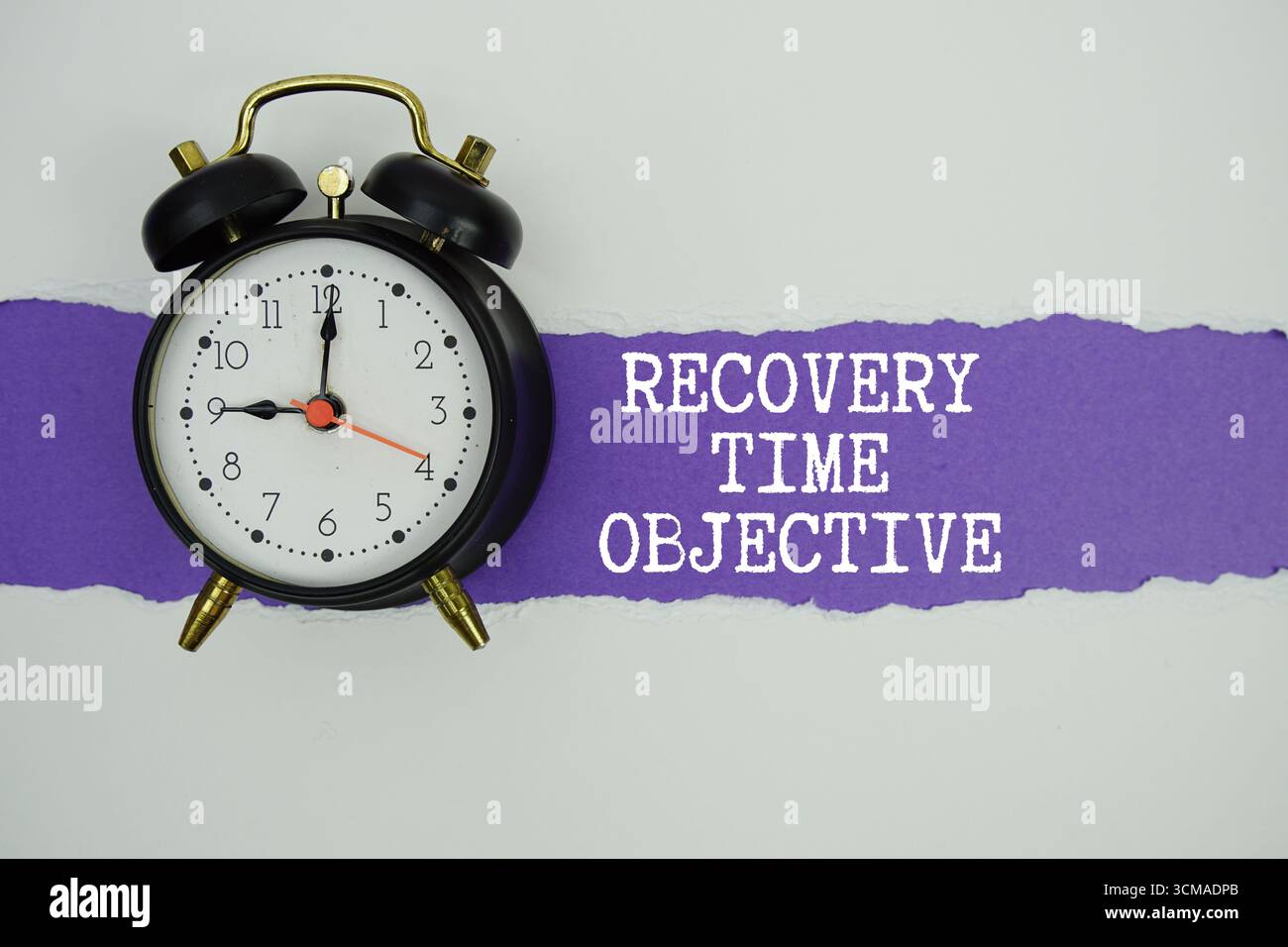 RTO Recovery Time Objective text on purple with white paper torn ripped ...