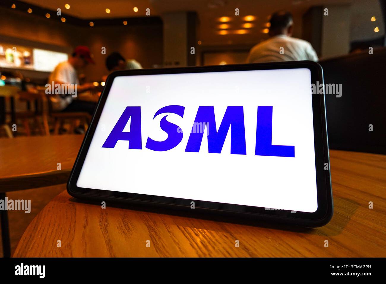 In this photo illustration, the logo of ASML is displayed on the screen ...