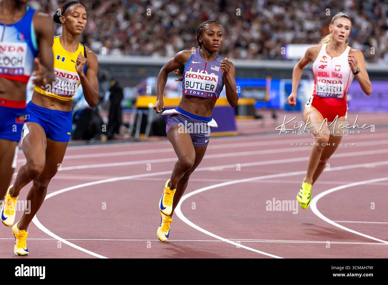 Aaliyah Butler (USA) runs a 400 meter qualifying round time of 49.09 ...