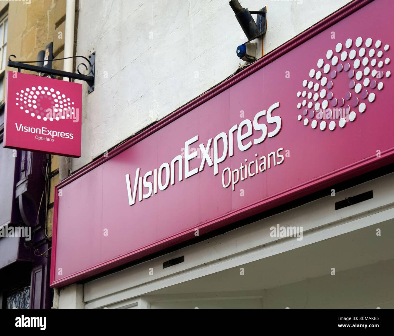 Vision Express opticians store front, High Street, Wells, England ...