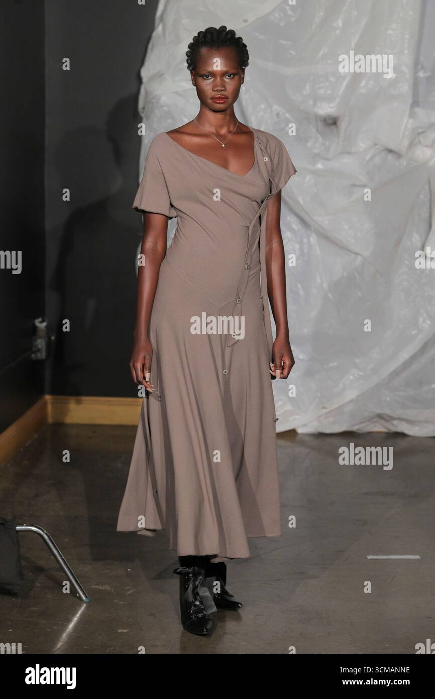A model is seen on the catwalk at the Gabe Gordon fashion show during ...
