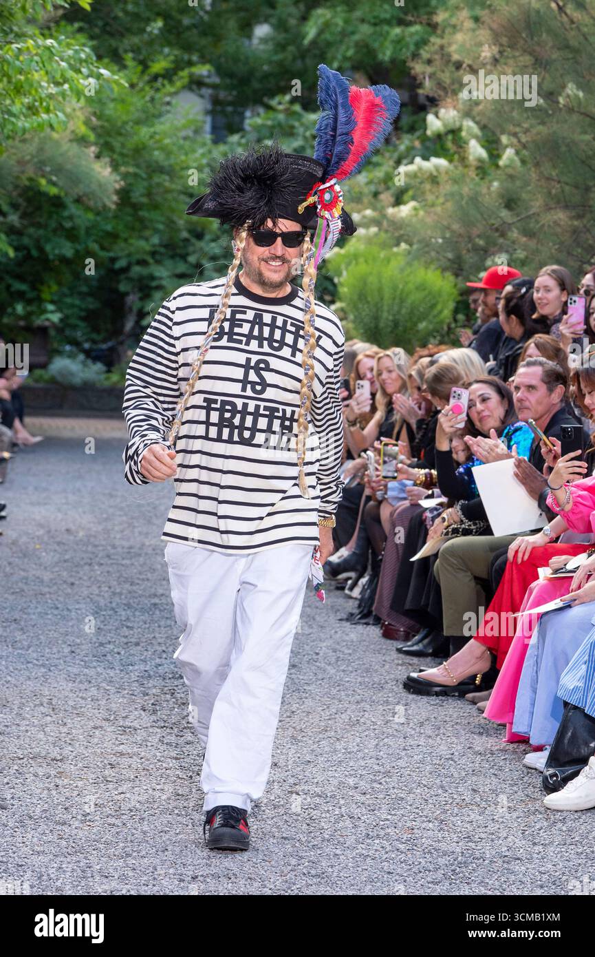 Johnson Hartig attends the runway finale for the Libertine fashion show ...
