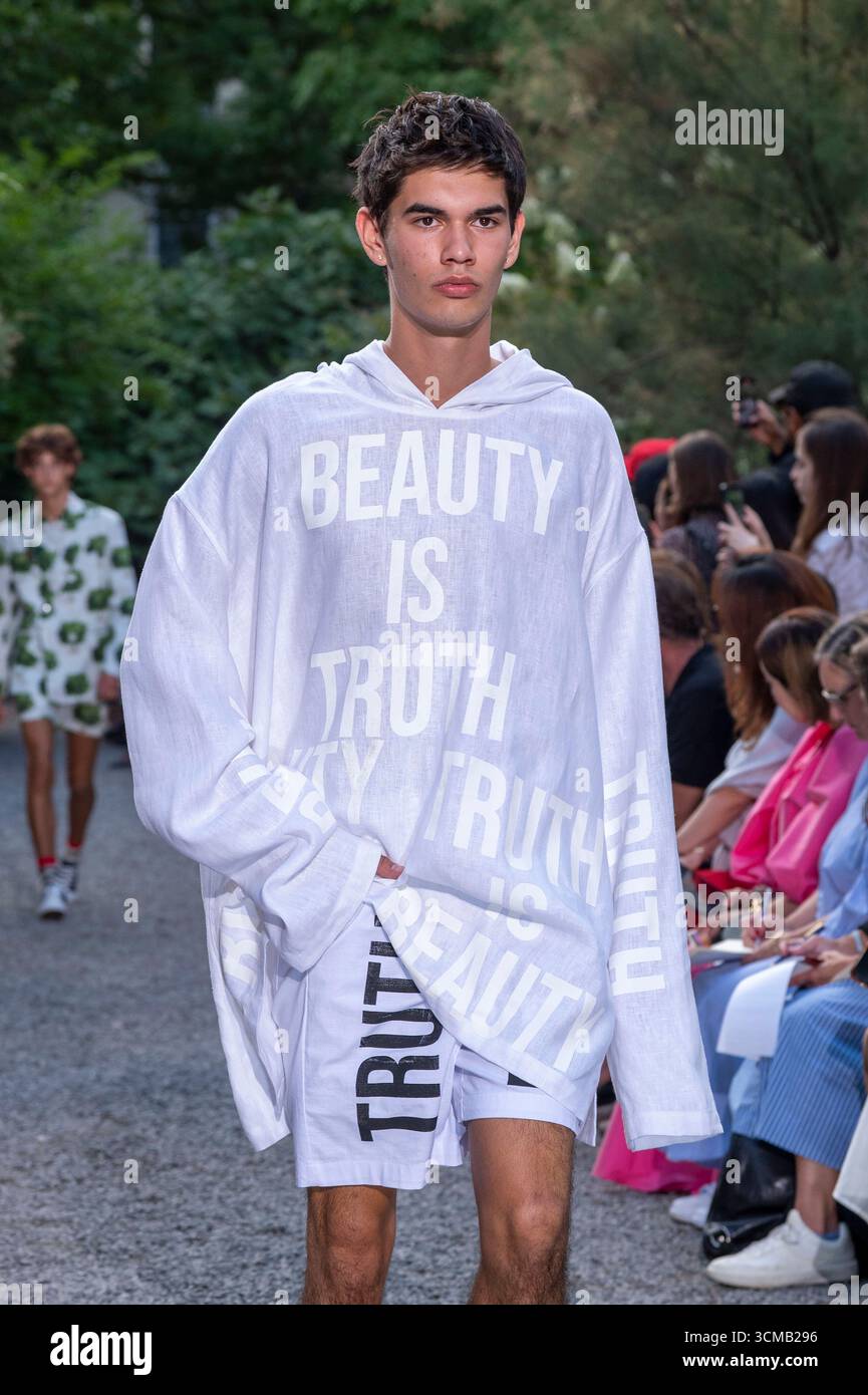 A model walks the runway for the Libertine fashion show during Spring ...