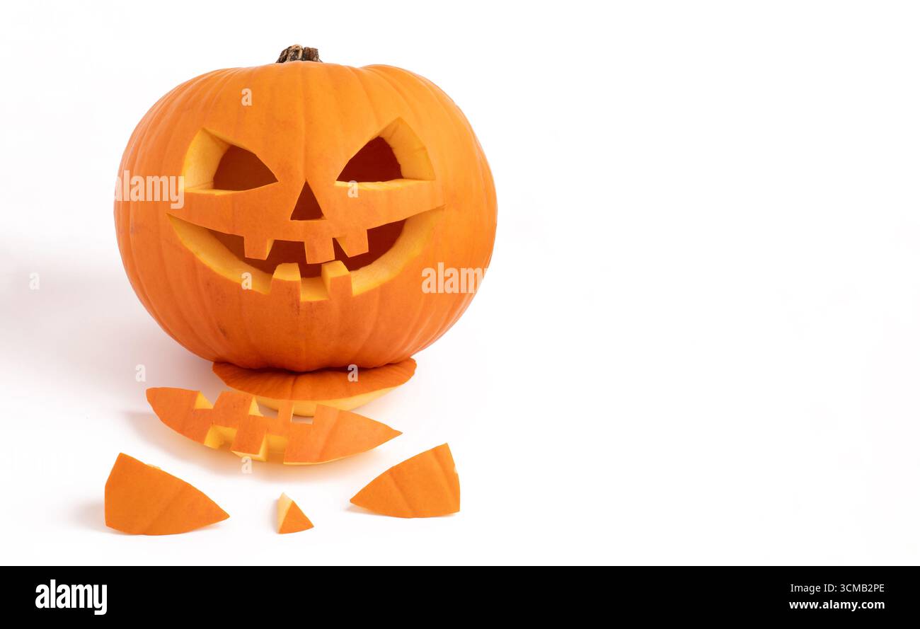 Halloween pumpkin carving with triangle eyes and toothy smile on white ...