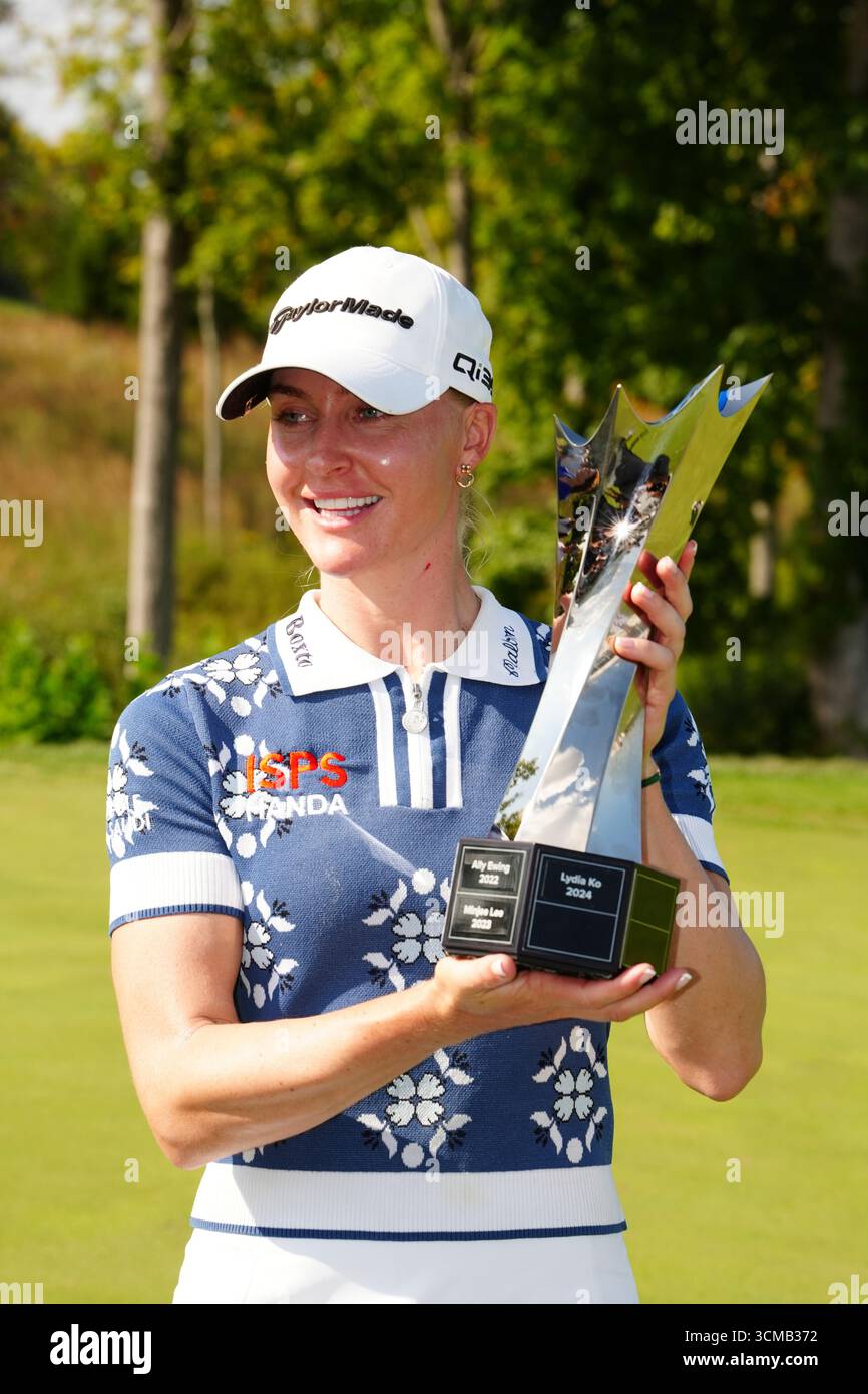 MAINEVILLE, OH - SEPTEMBER 14: LPGA golfer Charley Hull poses with the trophy after winning the ...
