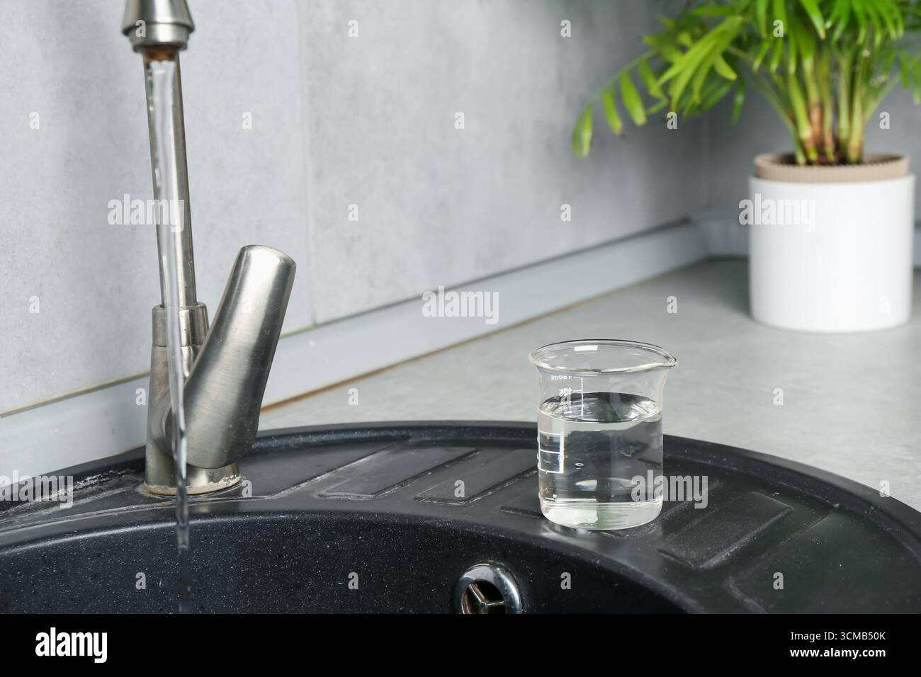 Sample water in beaker hi-res stock photography and images - Alamy